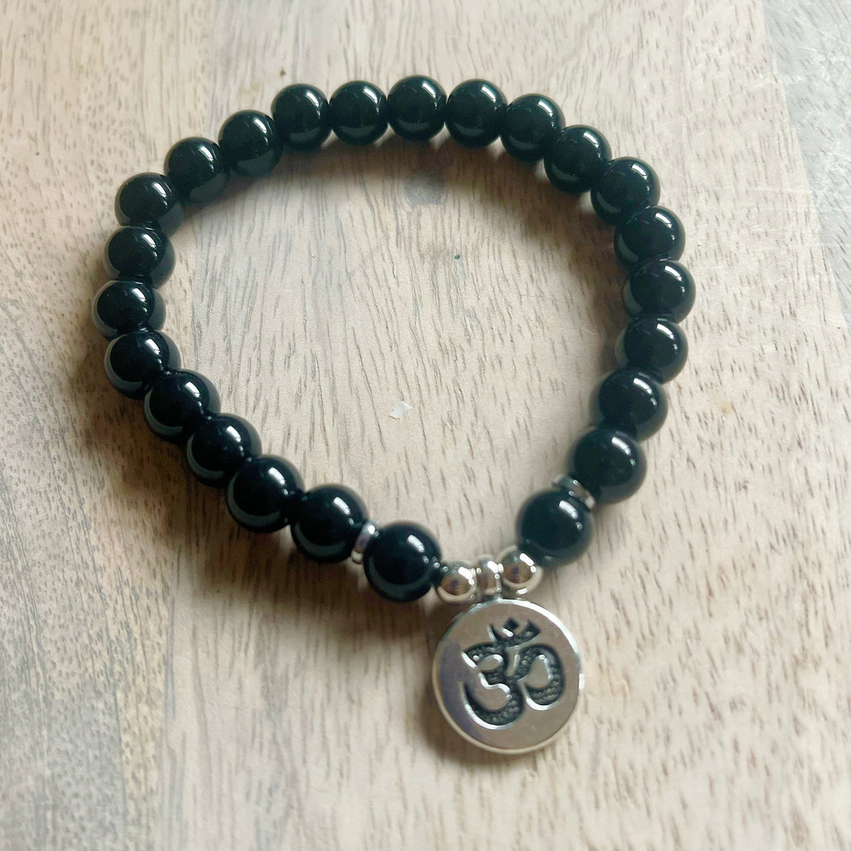 Black Onyx OM Bracelet – Rocky's Crystals & Minerals